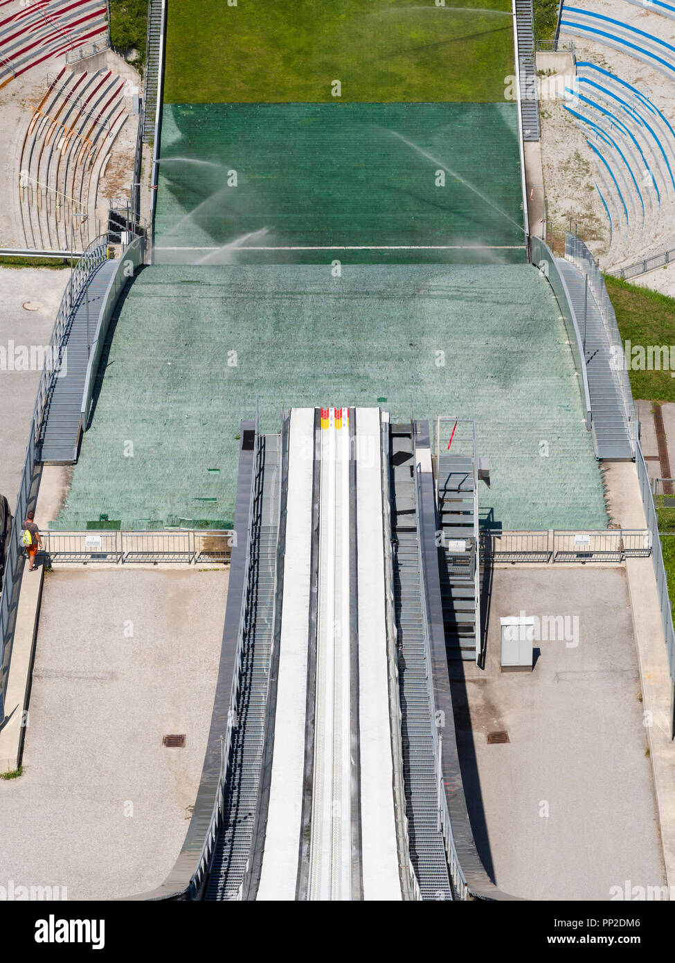 Looking down the steep ski tracks from the top of Bergisel Ski Jump at ...