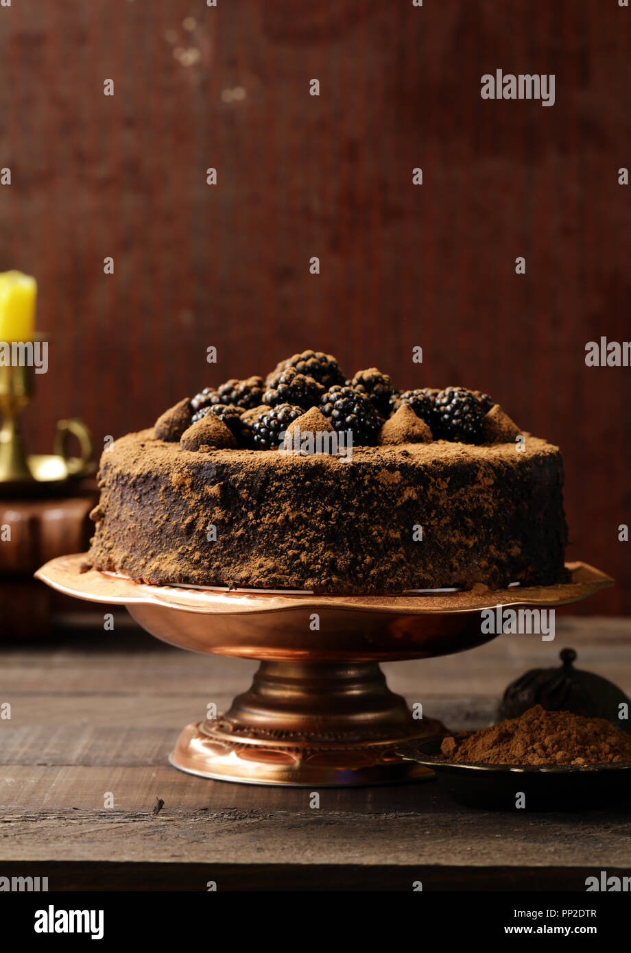 super chocolate truffle cake with black raspberries Stock Photo - Alamy