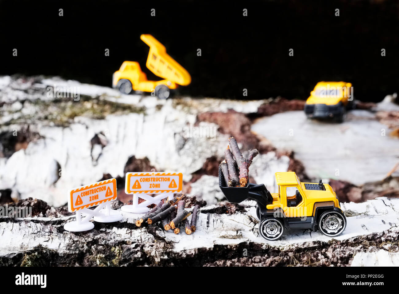 Toy yellow construction truck digger and jeep in building site scene ...