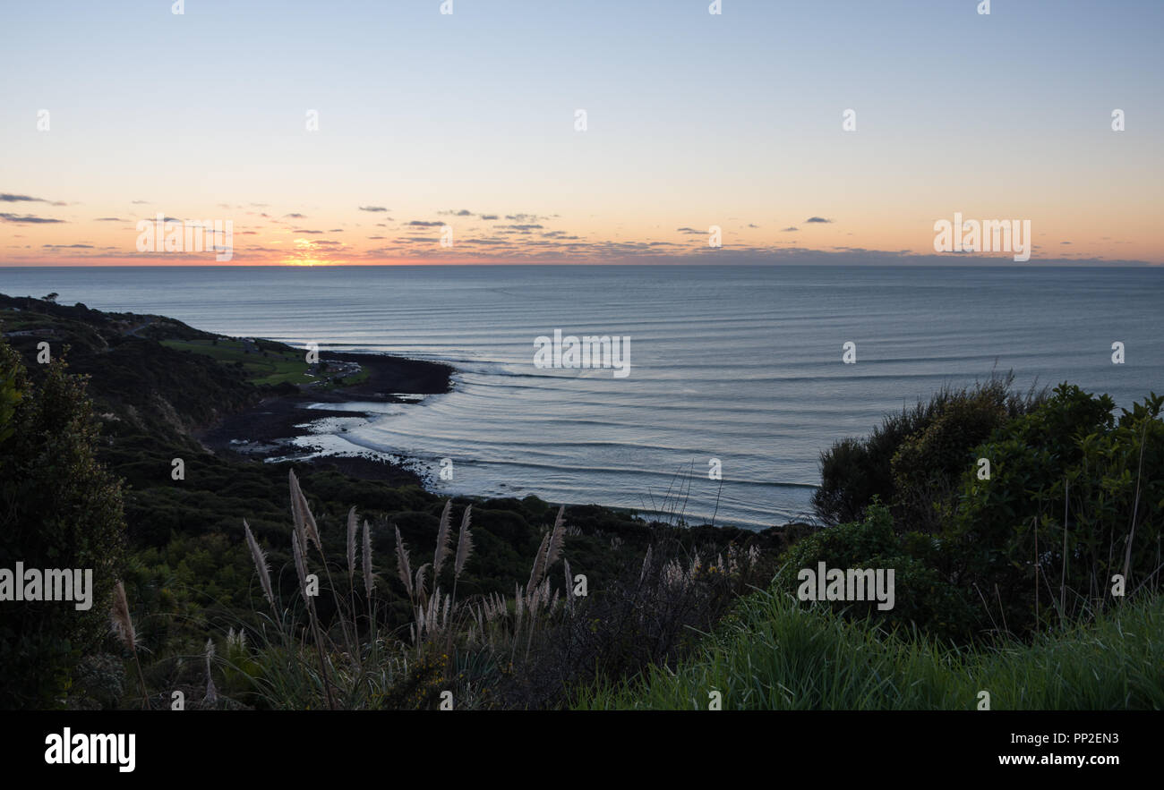 Manu Bay Sunset in Raglan, New Zealand Stock Photo - Alamy