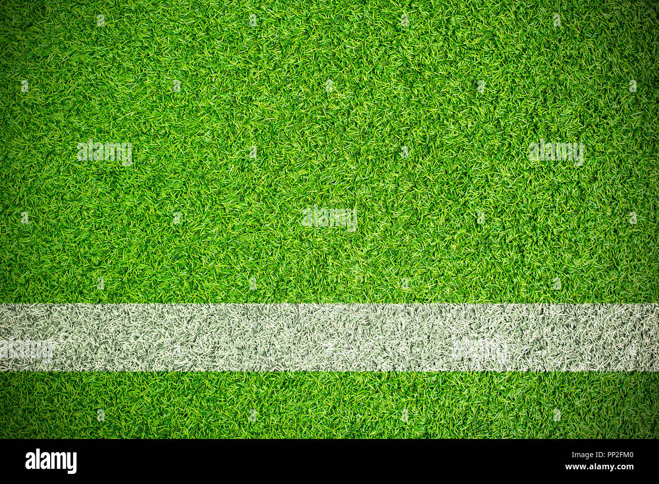 green grass sport field with white stripe Stock Photo - Alamy