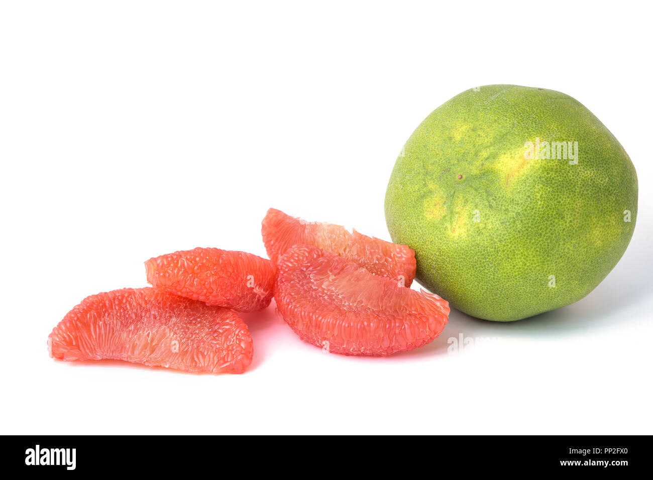 red pomelo pulp fruit isolated on white background Stock Photo - Alamy