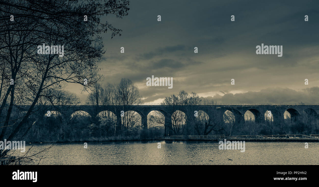 Railway viaduct and lake, Reddish Vale country park, Stockport ...