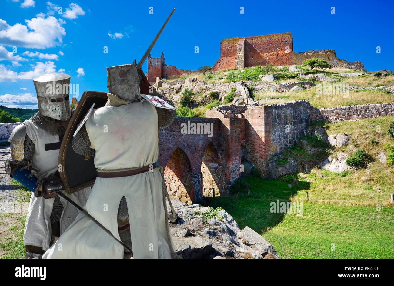Medieval knights fighting by ruins of Hammershus castle - the biggest ...