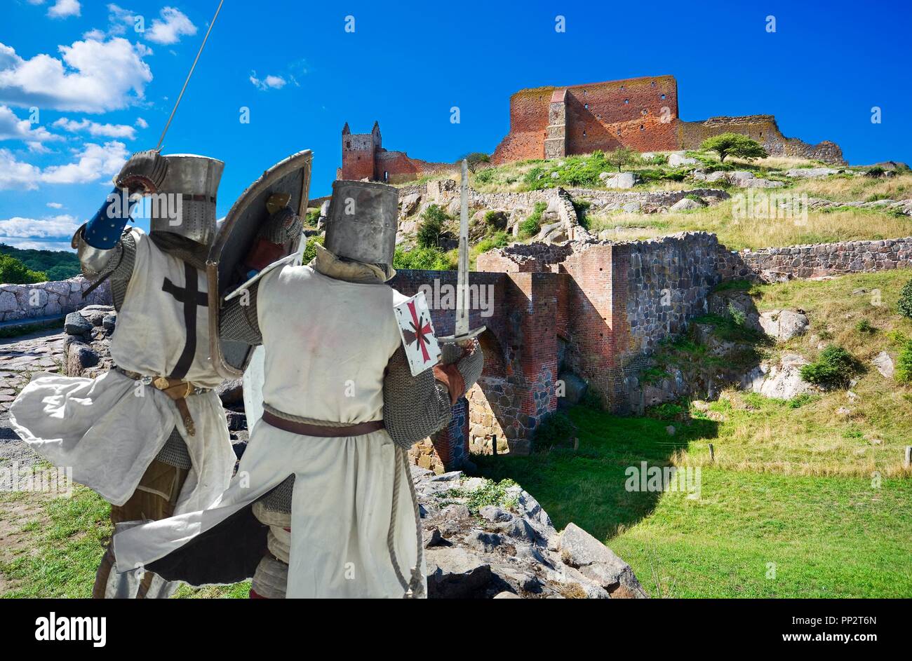 Medieval knights fighting by ruins of Hammershus castle - the biggest ...