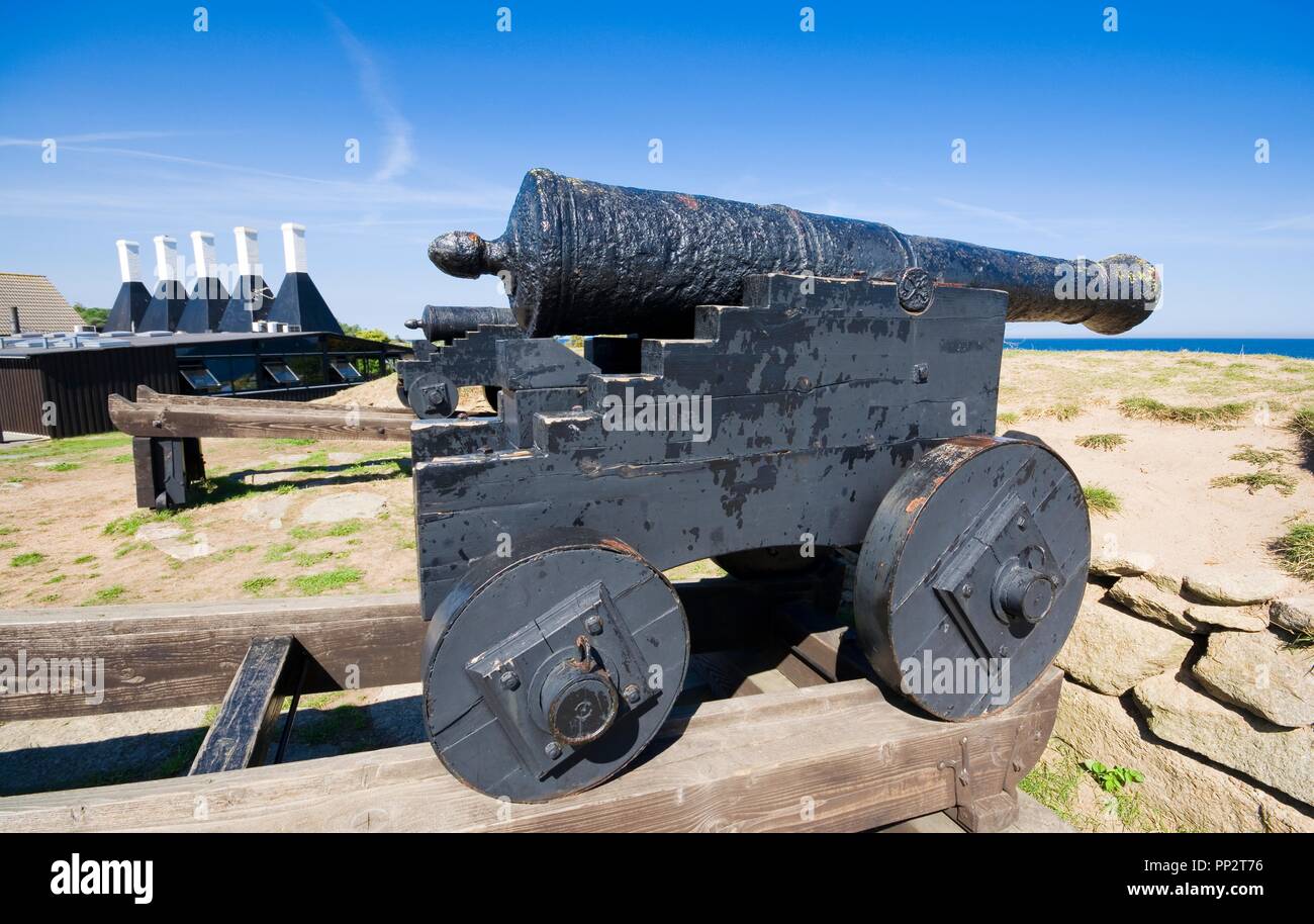Old rampart with its cannons on the coast of Baltic sea in Svaneke ...