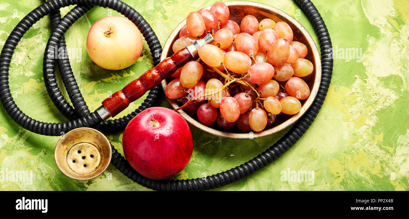 Turkish smoking hookah with taste of a fruit mixture of grapes and ...
