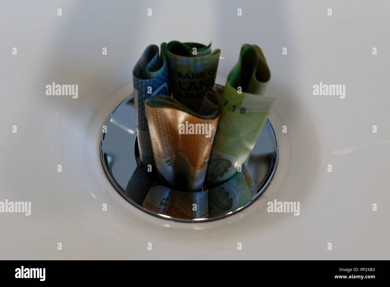 Down the plug hole hi-res stock photography and images - Alamy