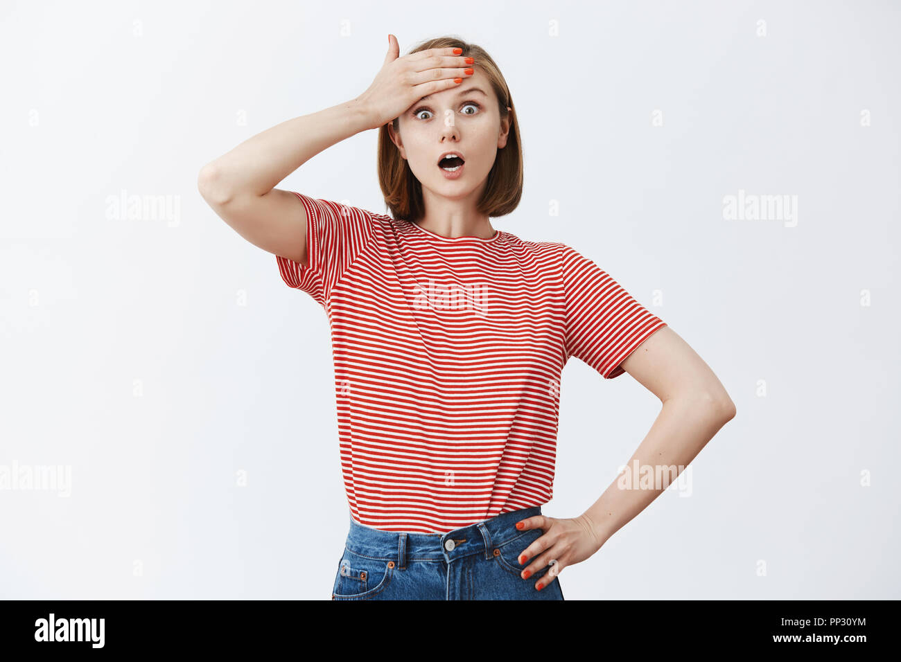 Oh gosh I forgot to turn off iron. Portrait of shocked and intense ...