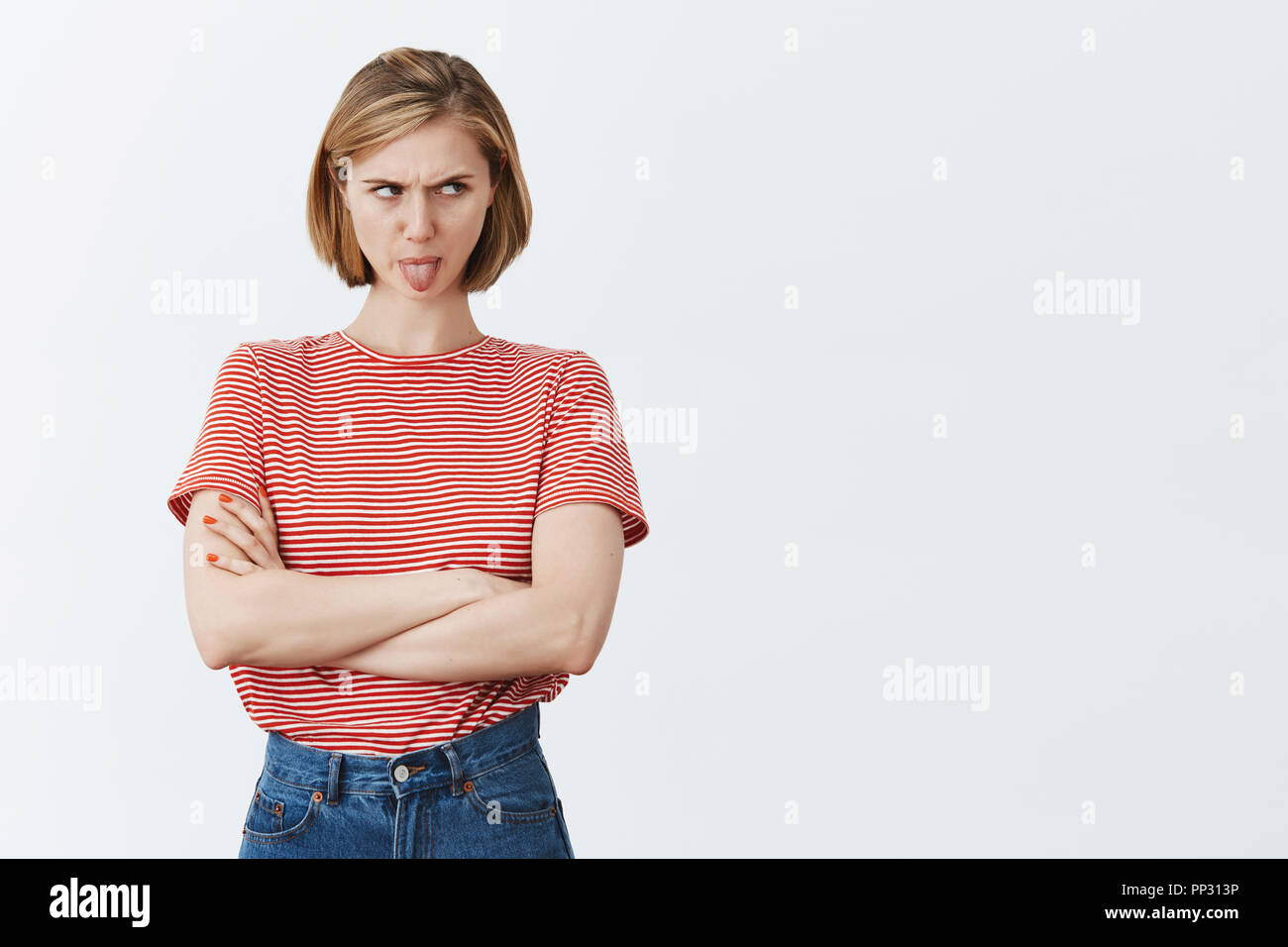Moody childish woman being offended, sulking and expressing ...