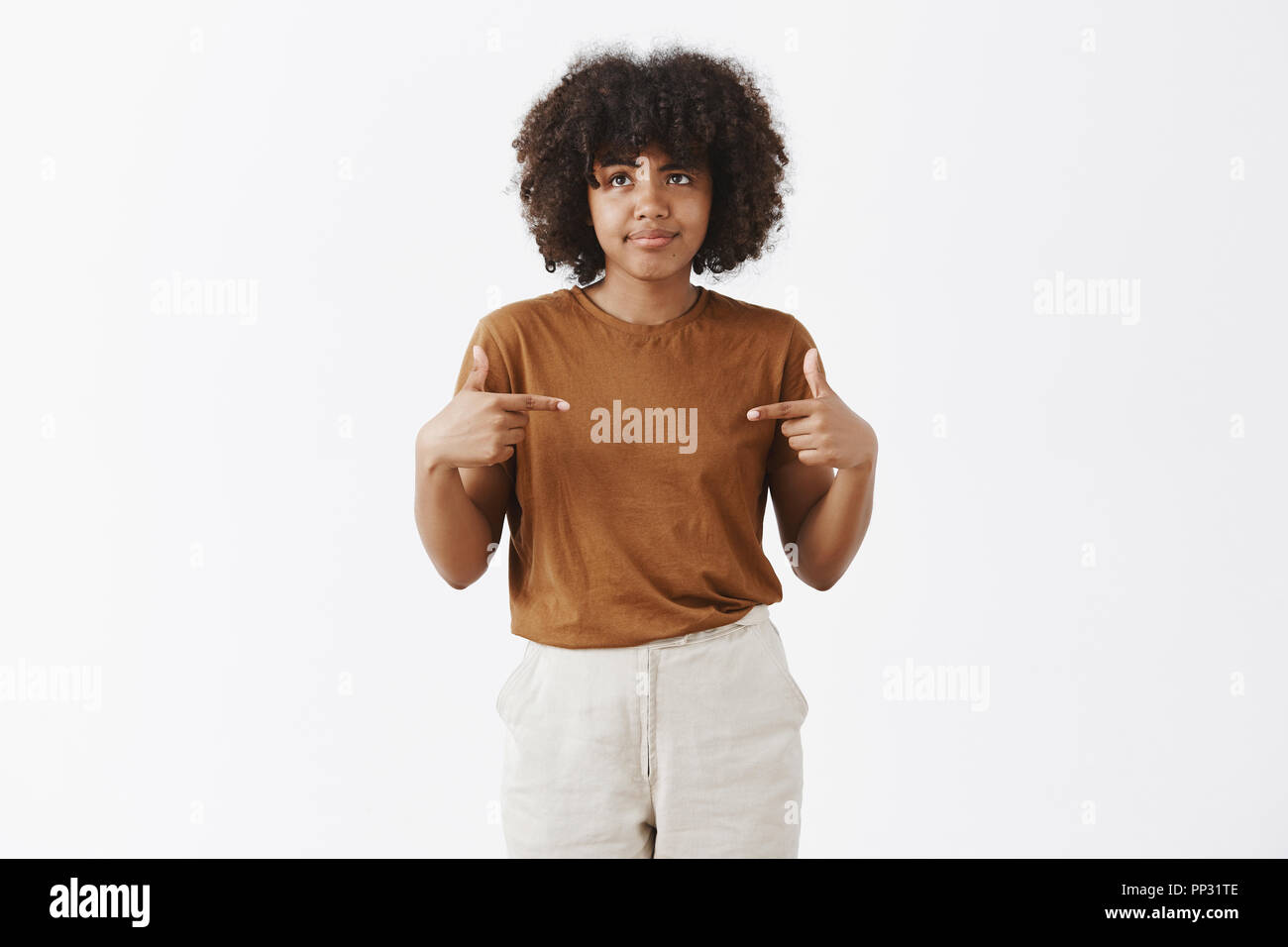 Indoor shot of intense african american woman being unhappy and ...