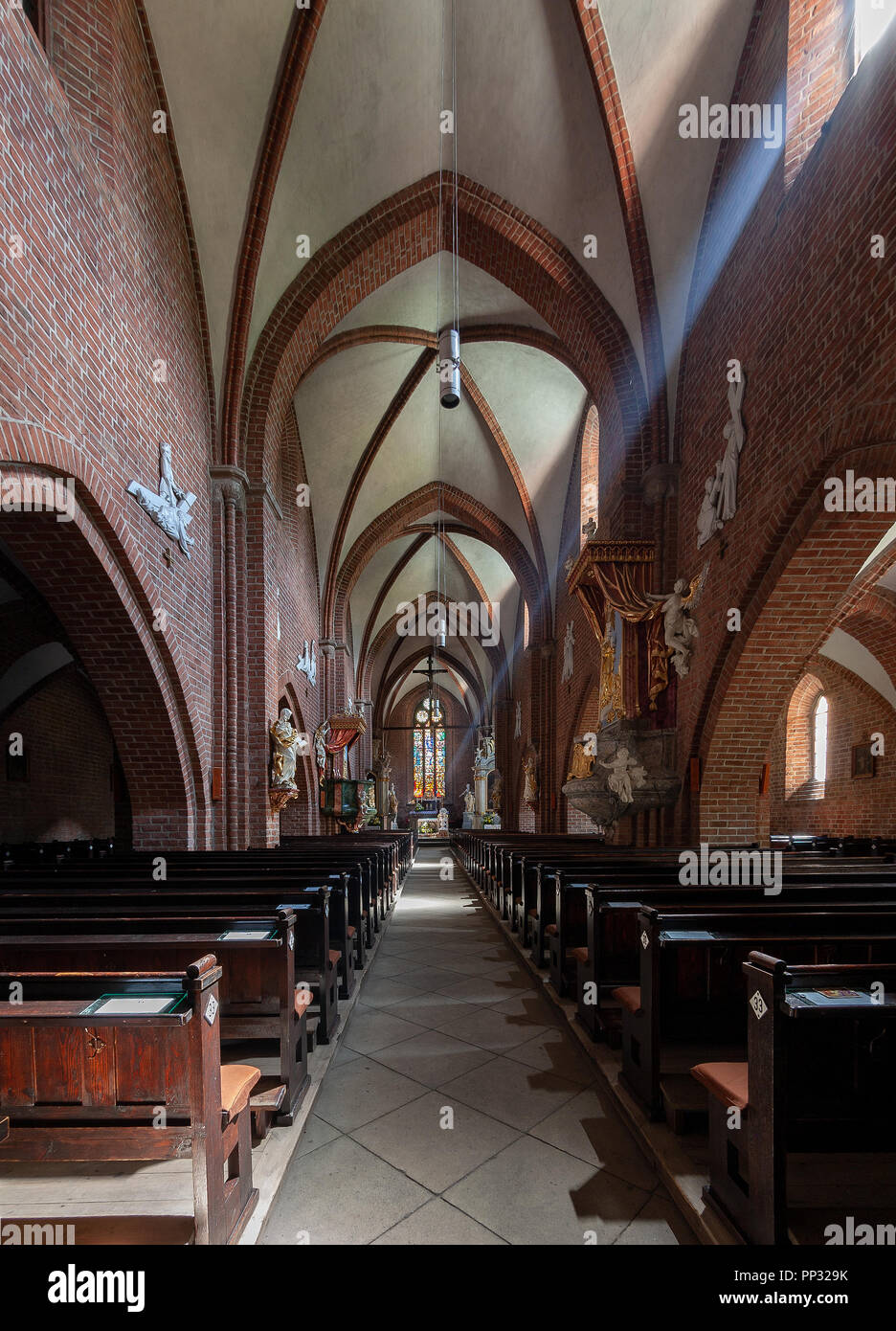 An old brick church with sunbeam Stock Photo - Alamy