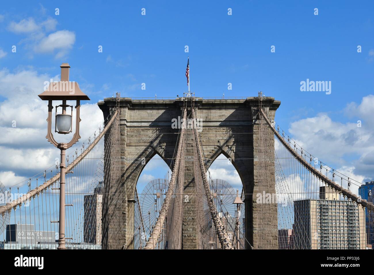 The iconic Brooklyn Bridge spanning the East River between Lower ...
