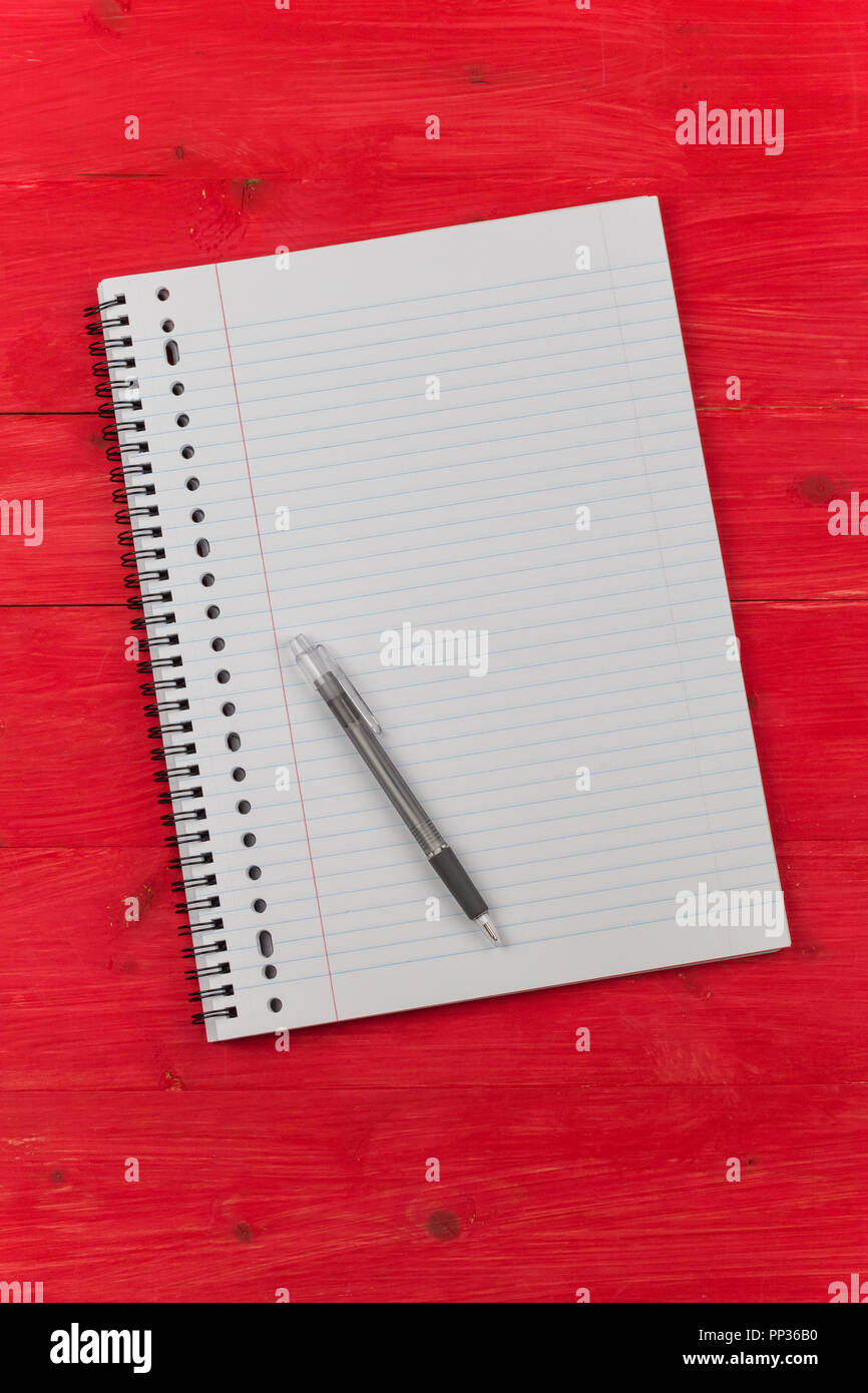 Red notepad with pen hi-res stock photography and images - Alamy