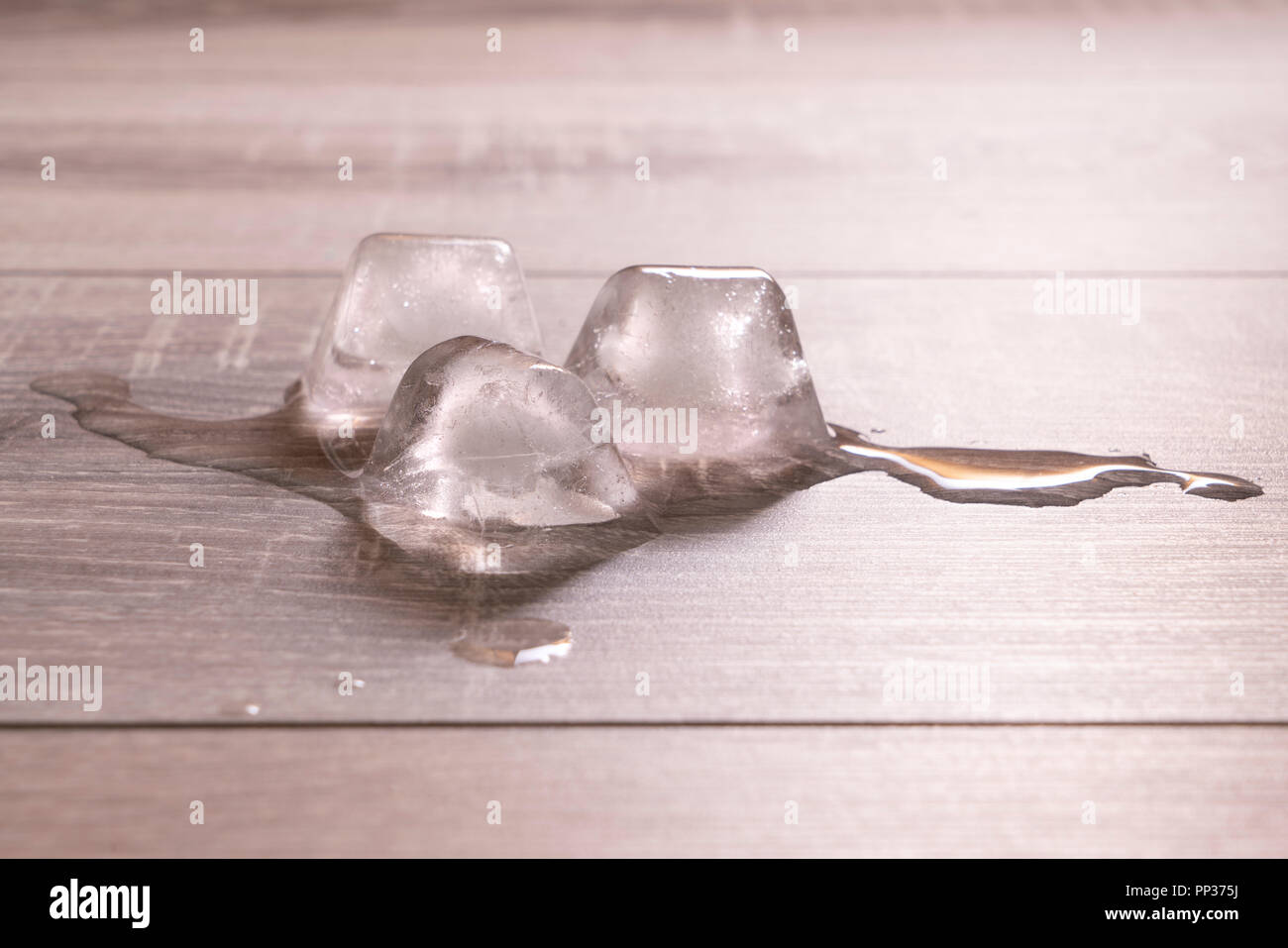 Ice cubes melting hi-res stock photography and images - Alamy