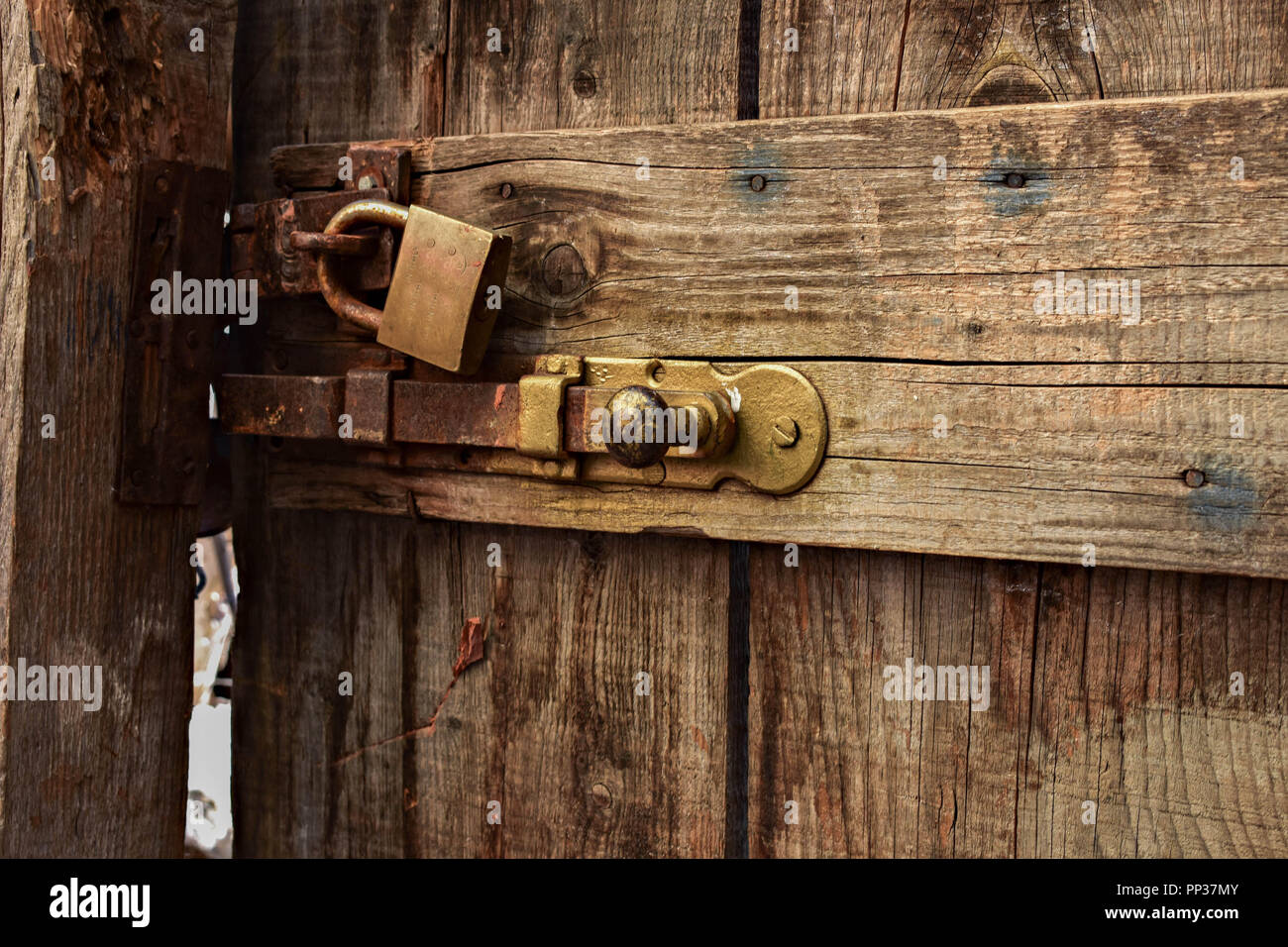 texture of old wooden door with metal padlock/ old wooden door whit ...