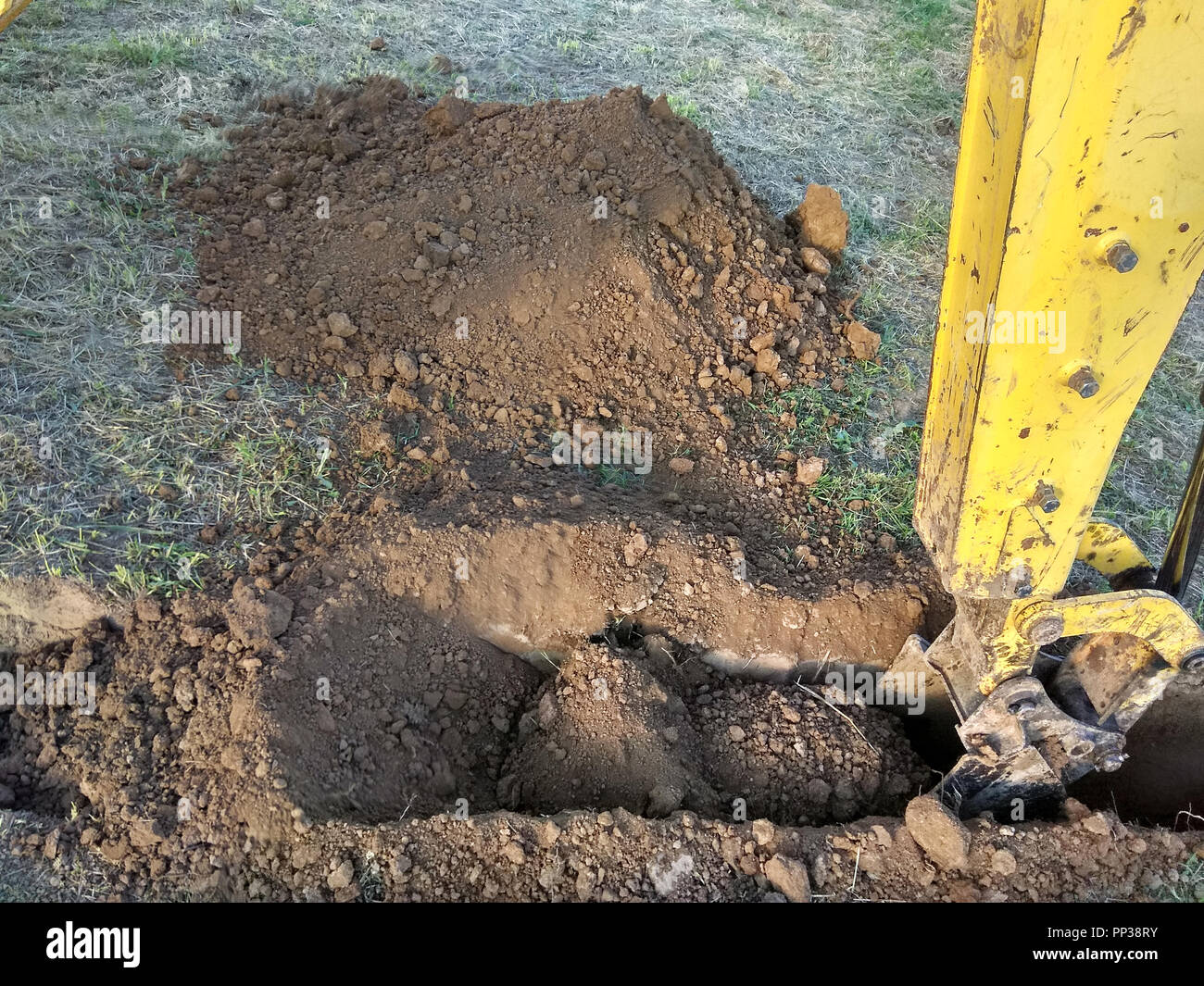 Mechanical excavator shovel digging hole hi-res stock photography and ...