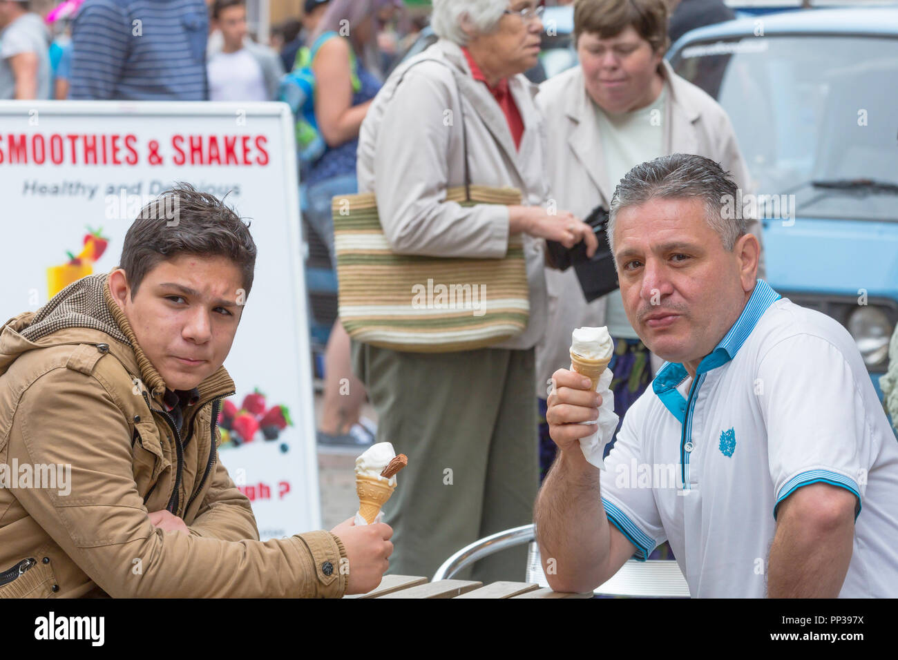 Two men eating ice cream hi-res stock photography and images - Alamy