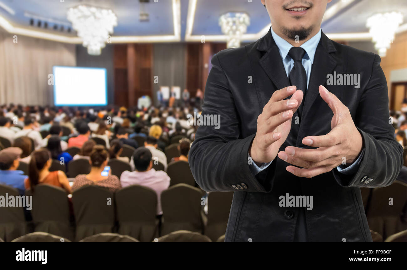 Closeup Businessman clapping and smiling on Abstract blurred photo of ...