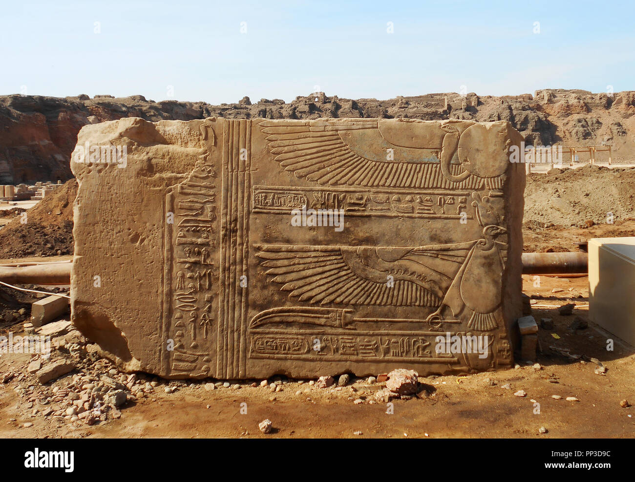 A huge block of stone, covered in hieroglyphics, lies at the ancient ...