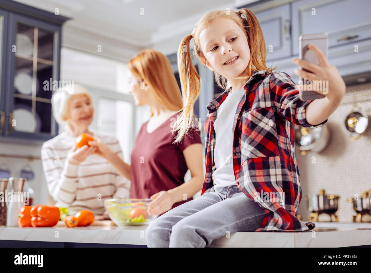 Senior woman cooking cute hi-res stock photography and images - Alamy