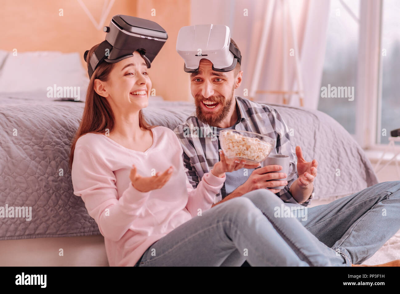Watching funny film hi-res stock photography and images - Alamy