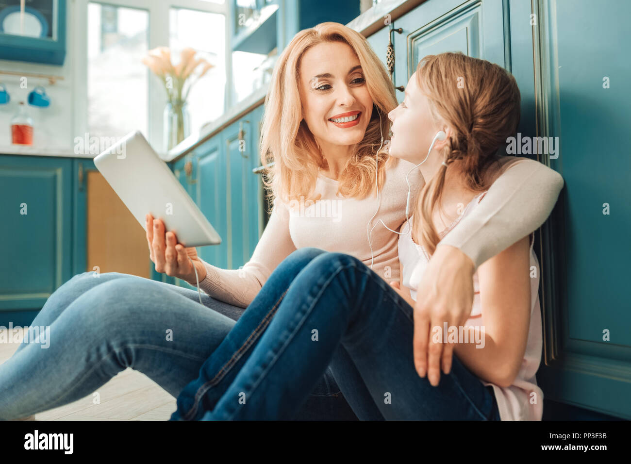 Charming young mother communicating with her kid Stock Photo - Alamy