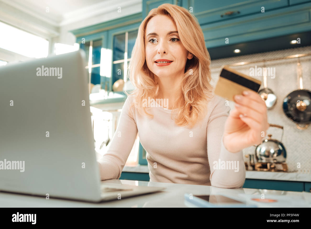 Concentrated female person staring at screen of laptop Stock Photo - Alamy