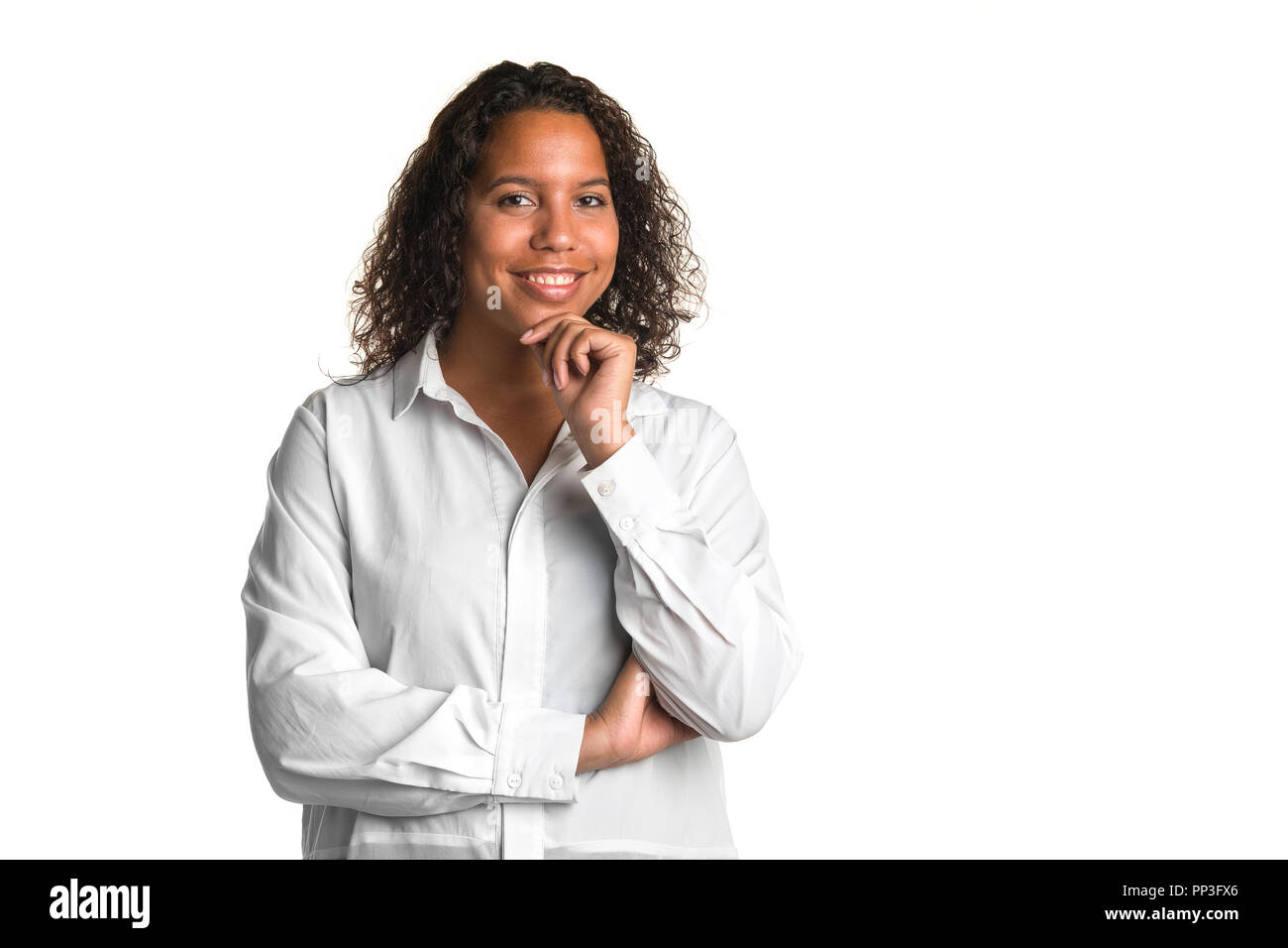Young pretty black business woman thinking with arms crossed on a white ...