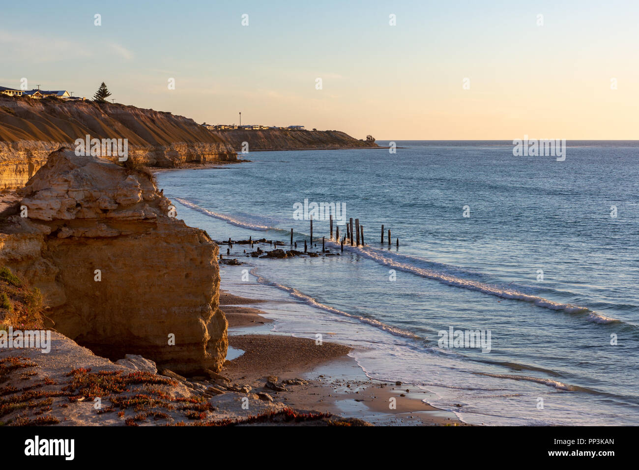 Sunset at the iconic Port Willunga Jetty ruins looking down from the ...