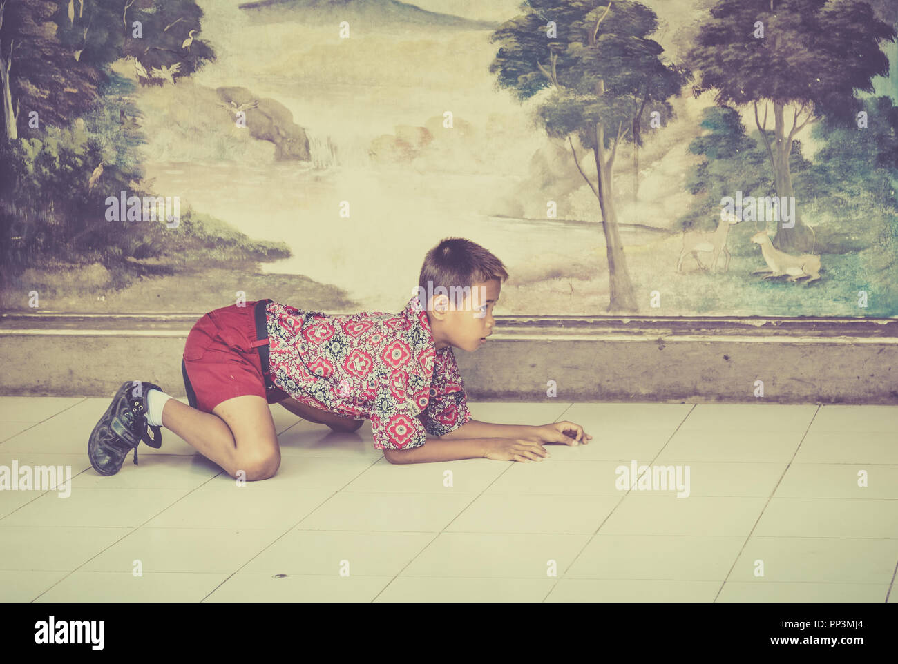 BALI, INDONESIA - APRIL 25, 2018: Young balinese pupil playing outdoors ...