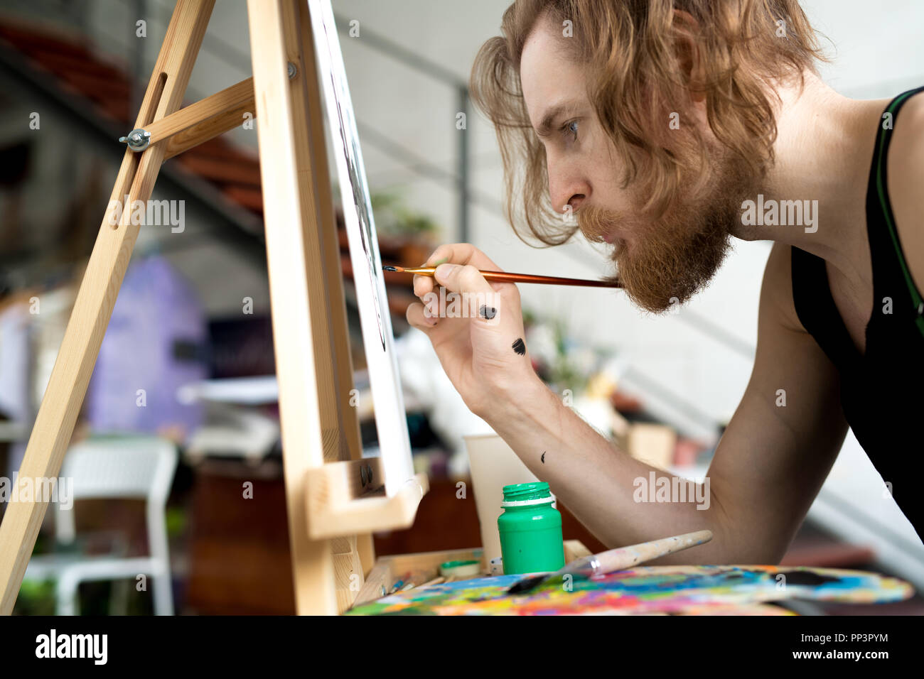 Bearded Artist Painting Picture Stock Photo - Alamy