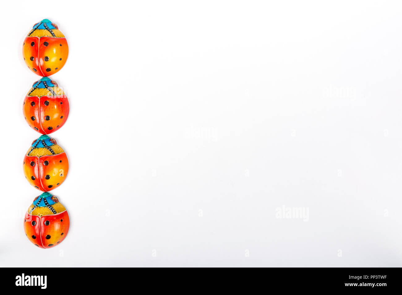 set of multicolored ladybugs forming an number 4 in Mexican ceramics ...