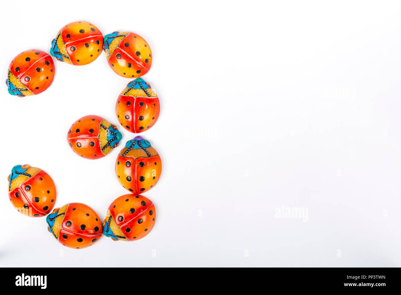 set of multicolored ladybugs forming an number 3 in Mexican ceramics ...