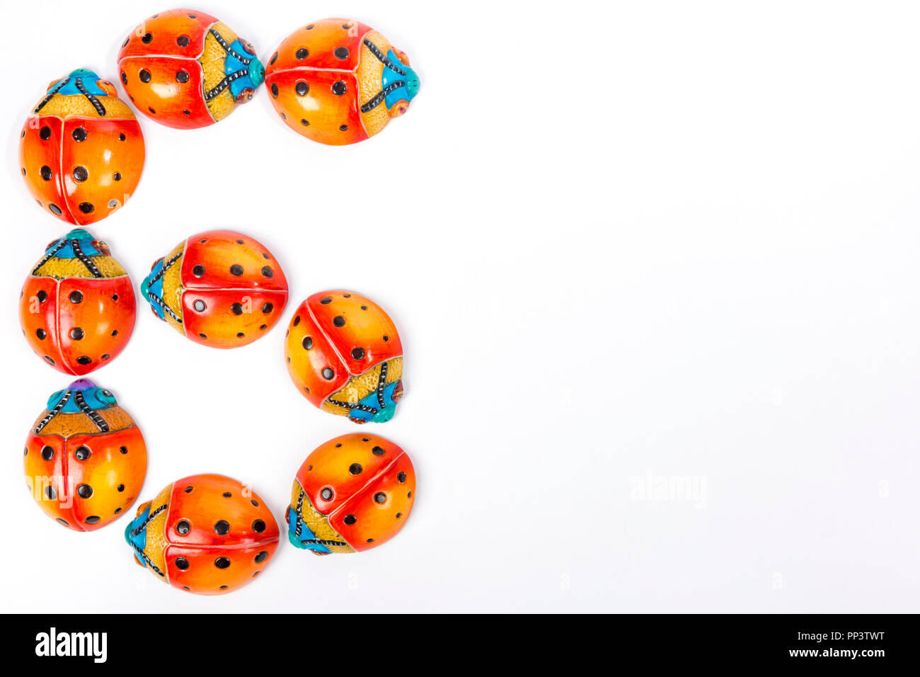 set of multicolored ladybugs forming an number 6 in Mexican ceramics ...