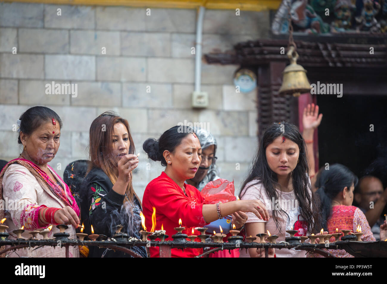 Kathmandu,Nepal - Sep 08,2018: Hindu women offering prayers to god ...