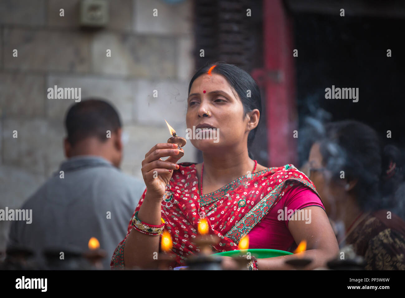 Kathmandu,Nepal - Sep 08,2018: Hindu woman offering prayers to god ...