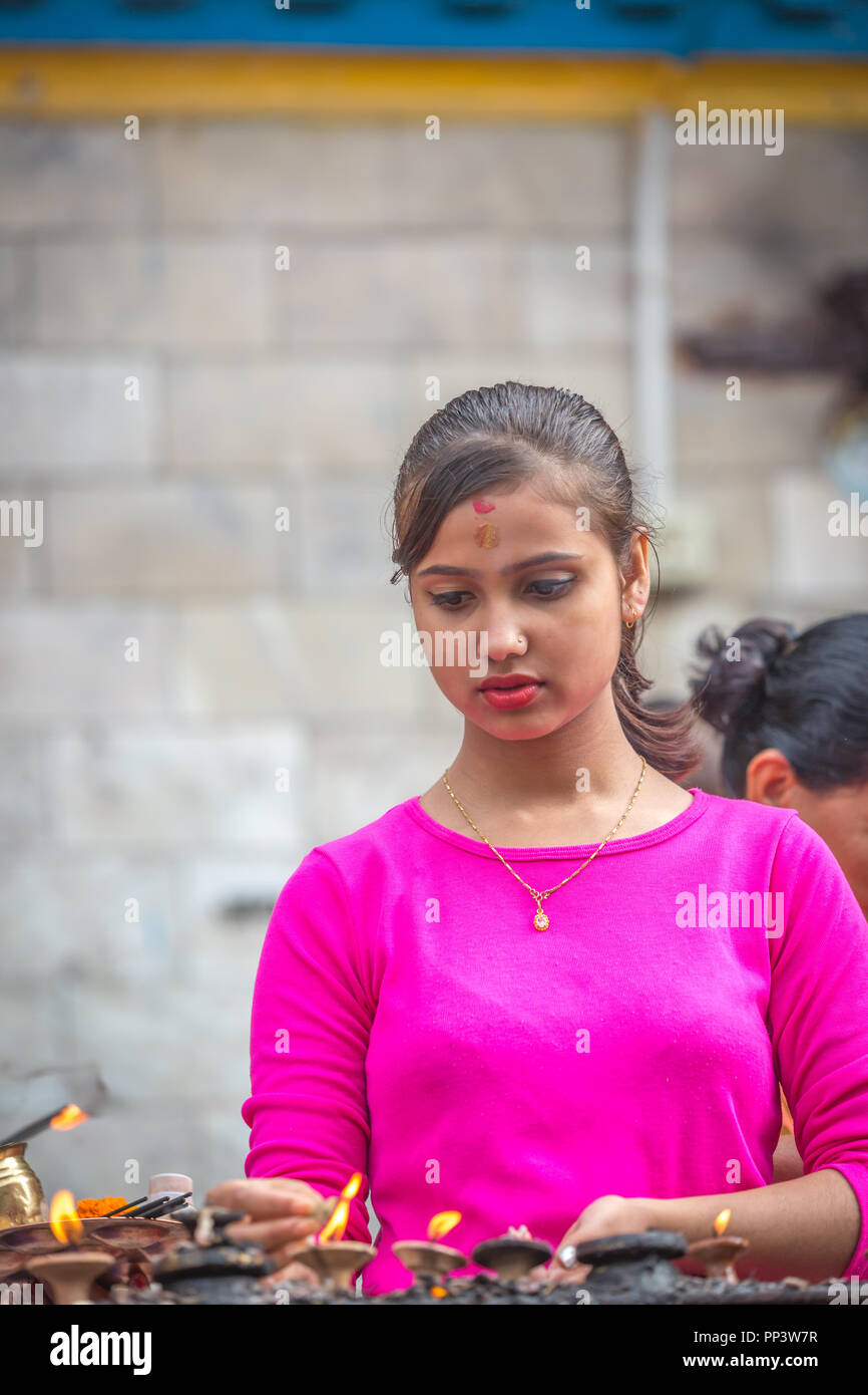 Kathmandu,Nepal - Sep 08,2018: Young Hindu Nepali girl offering prayers ...