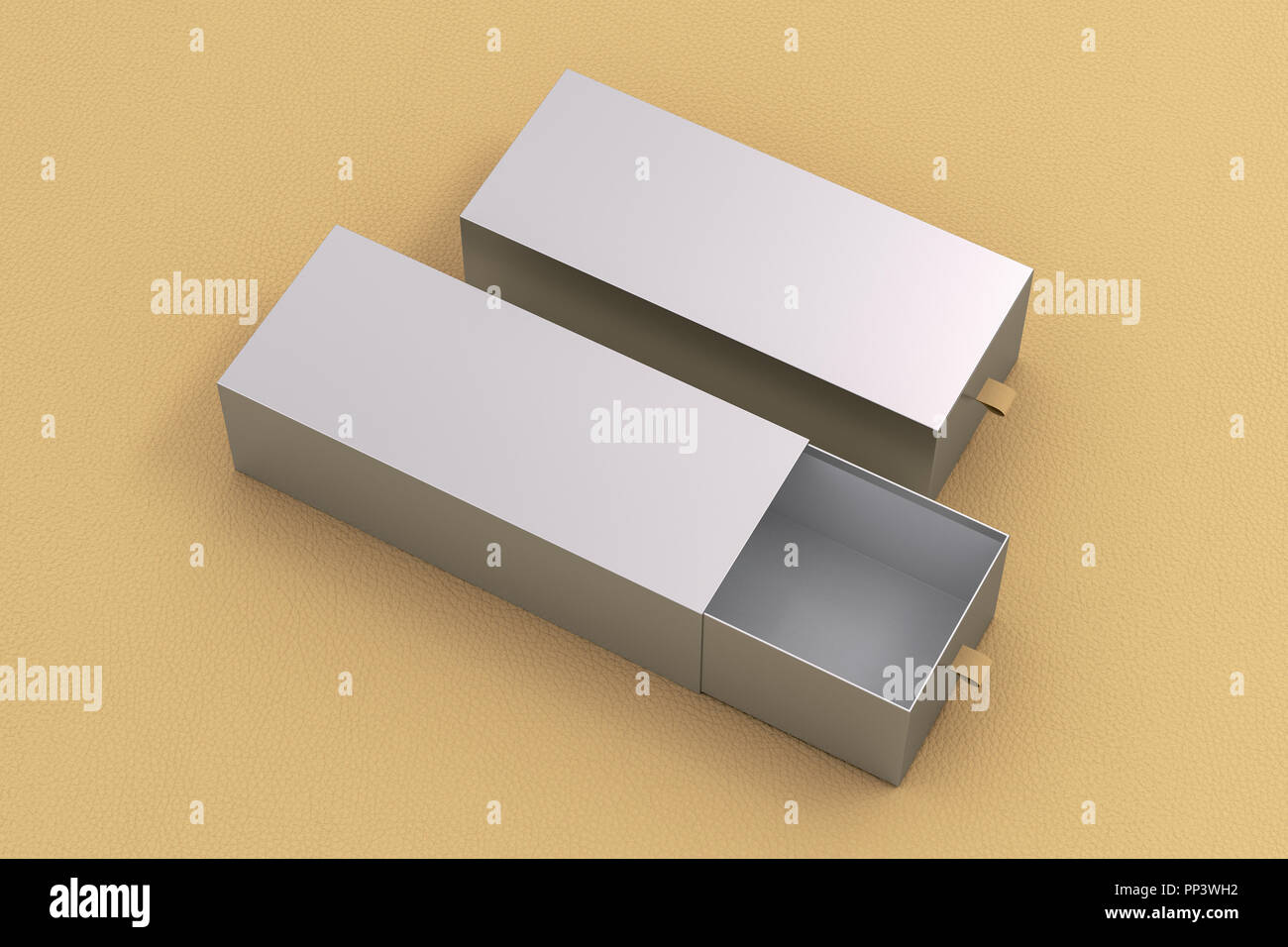Open and closed silver blank empty long boxes on beige leather ...