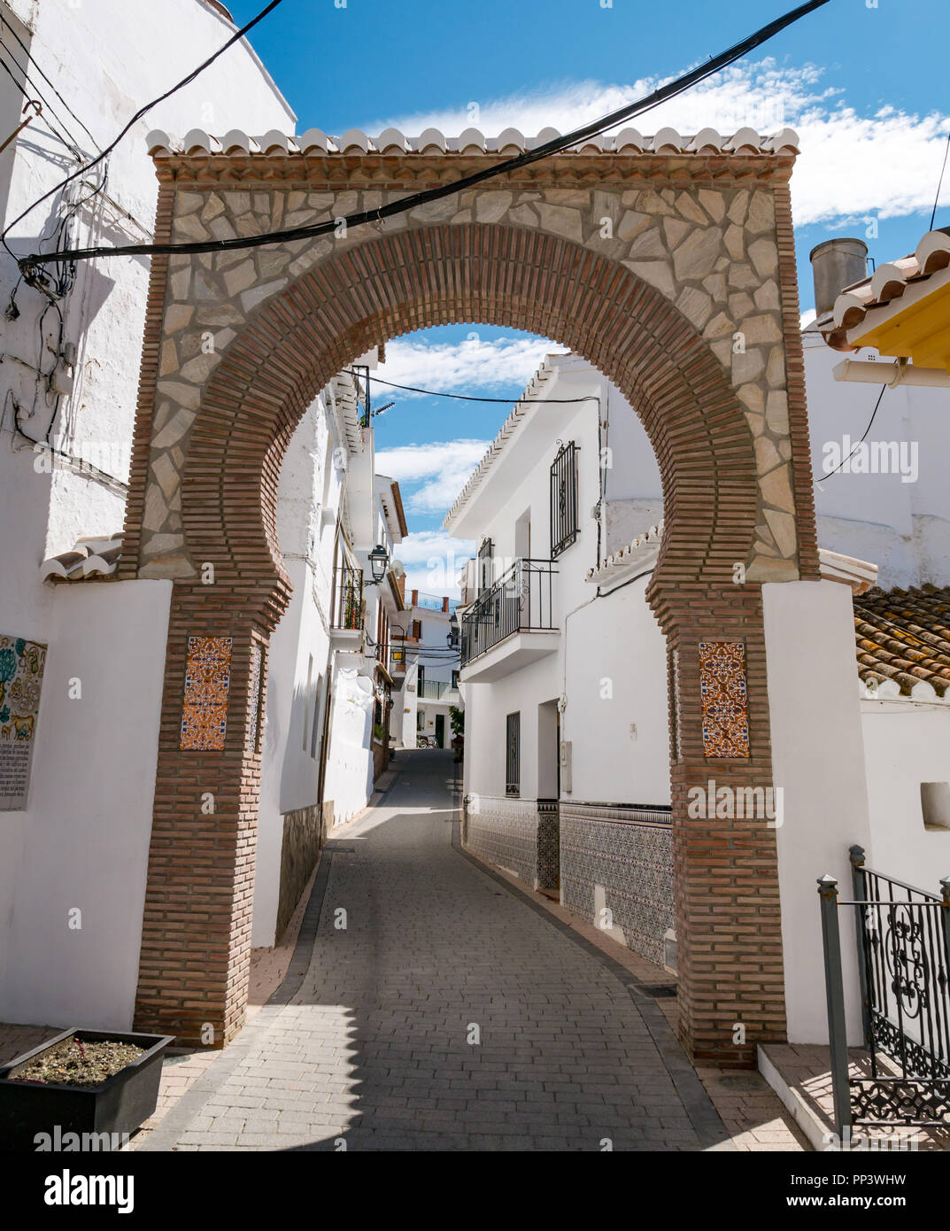 Entrance gateway to the hilltop village of Sedella, Axarquia, Andalusia ...