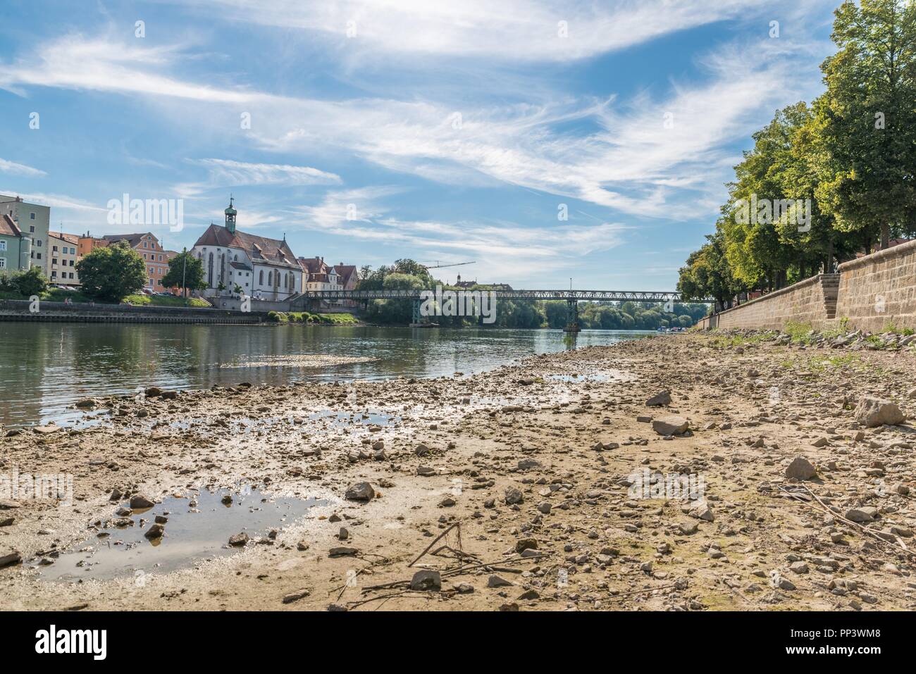 Low water level of the Danube with a view of the Iron Bridge in ...
