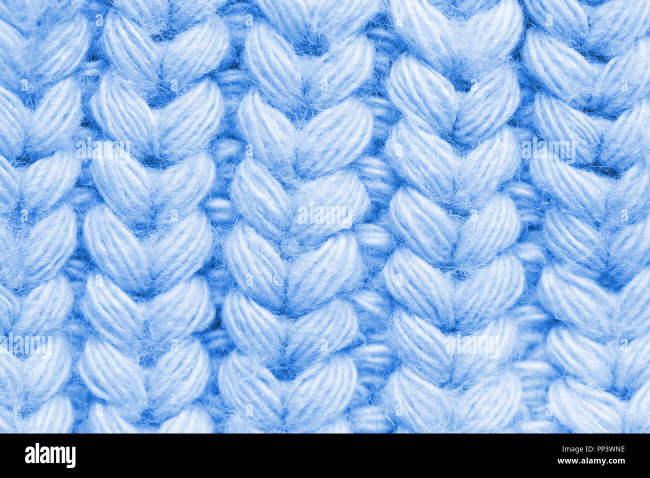 Macro of a woolen Pattern - Knitting Pattern with Purls and Knits. blue ...