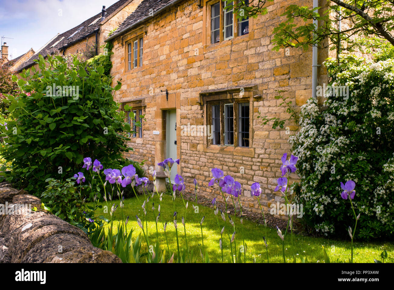 Cotswolds stone in the village of Longborough, England Stock Photo - Alamy