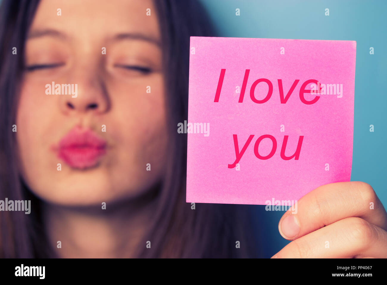 young girl shows a sign Stock Photo - Alamy