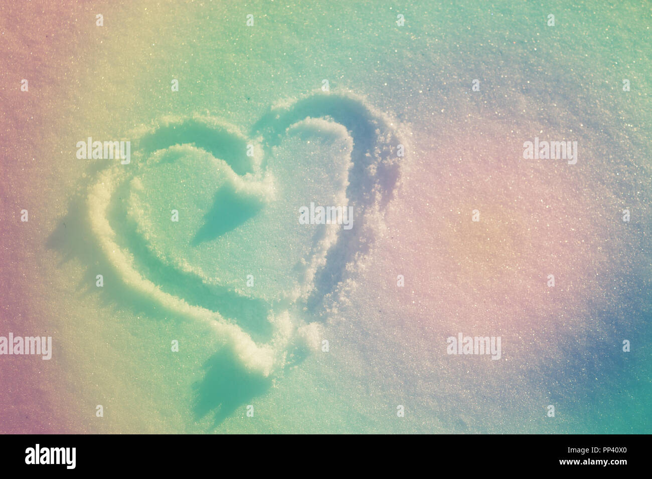 heart drawing in fresh white snow Stock Photo - Alamy