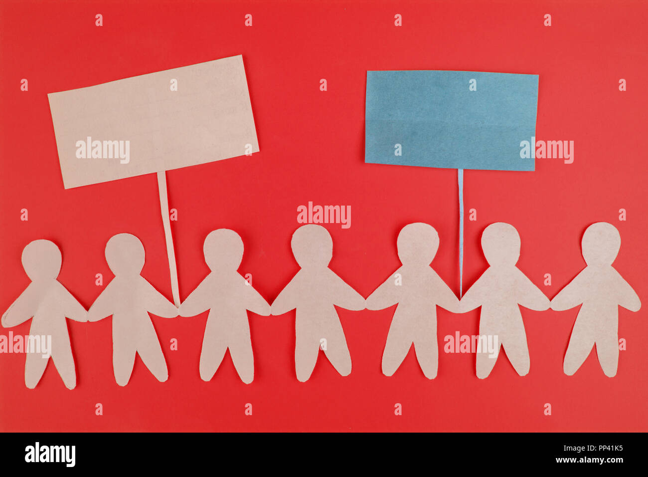 paper people with posters on the strike Stock Photo - Alamy
