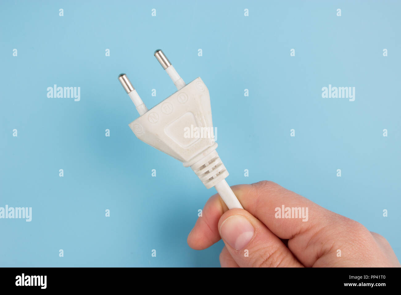 energy saving concept. electrical plug switched off Stock Photo - Alamy
