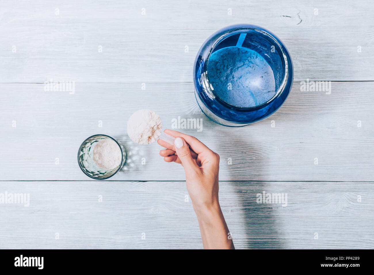 Woman making protein shake hi-res stock photography and images - Alamy