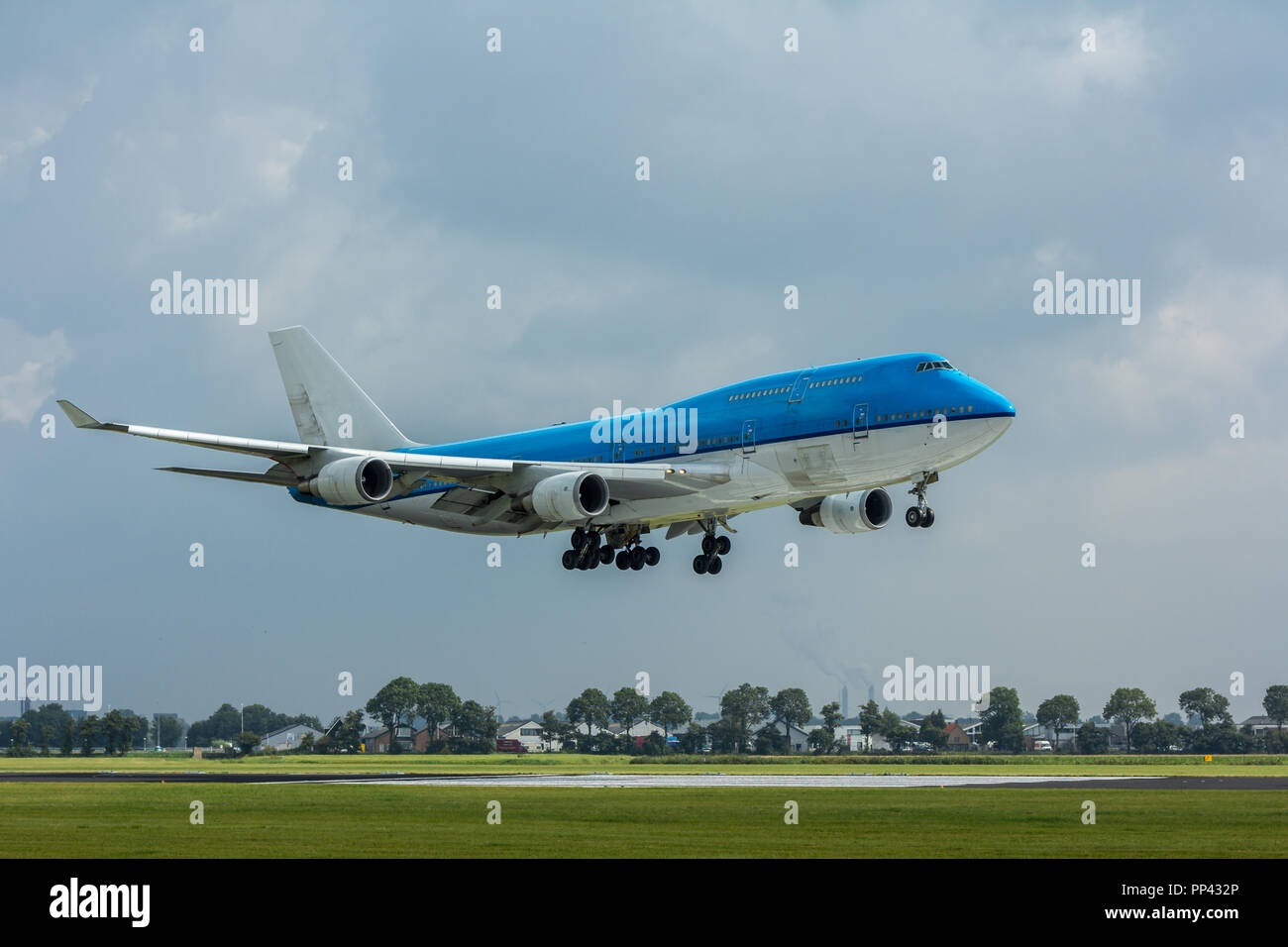 blue and white plane flying, passenger jumbo jet Stock Photo - Alamy