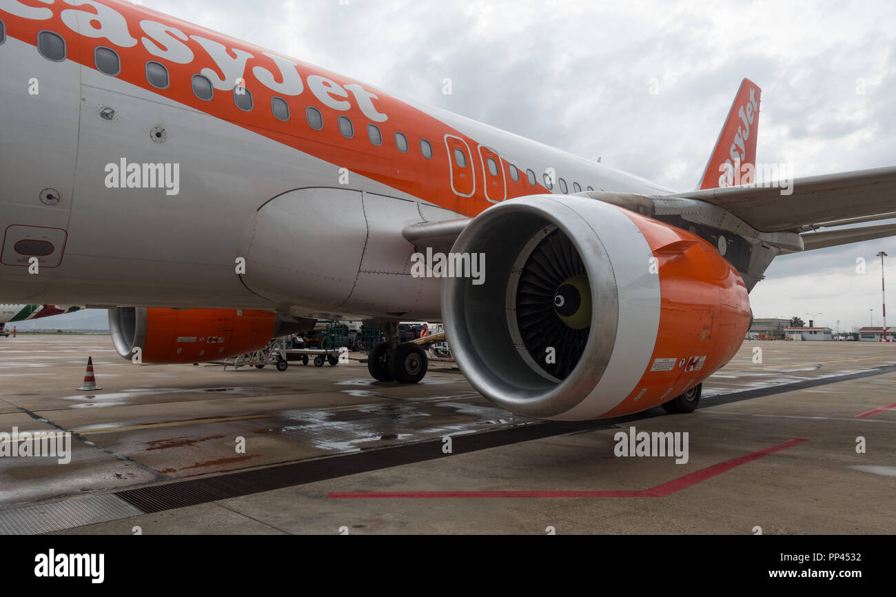 EasyJet aircraft on at loading gate, Cagliari Airport, Sardinia, Italy ...